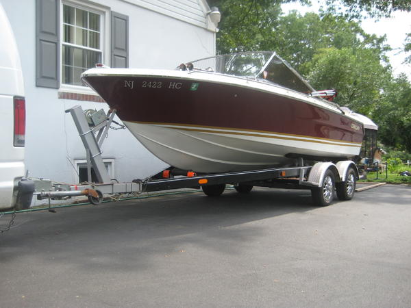 I just had the boat re painted. used Awlgrip/Awlcraft. sanded hull ...