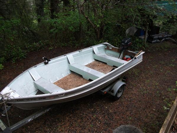 This is my old fishing buddy, 14ft. Valco with 8hp Johnson. Sold it ...